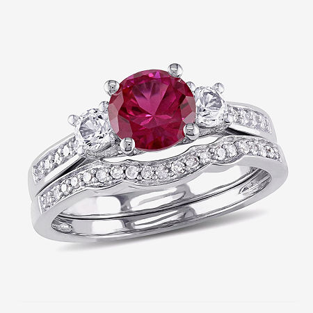Click here for Lab Created Ruby & 1/7 CT. T.W. Diamond 10K White... prices