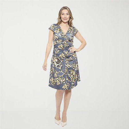 Click here for 24seven Comfort Apparel Womens Floral V-Neck Cap S... prices