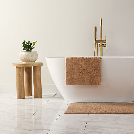 Click here for Casual Comfort Solid Reversible Bath Rug  One Size... prices