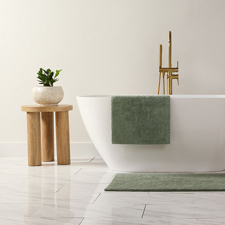 Click here for Casual Comfort Solid Reversible Bath Rug  One Size... prices