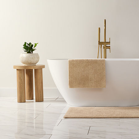 Click here for Casual Comfort Solid Reversible Bath Rug  One Size... prices