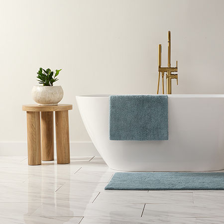 Click here for Casual Comfort Solid Reversible Bath Rug  One Size... prices