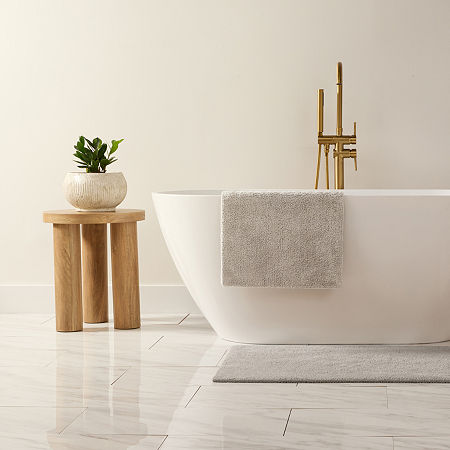 Click here for Casual Comfort Solid Reversible Bath Rug  One Size... prices