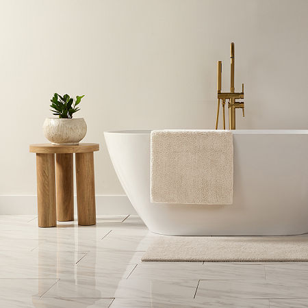 Click here for Casual Comfort Solid Reversible Bath Rug  One Size... prices