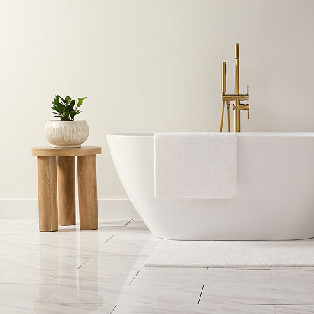 Click here for Casual Comfort Solid Reversible Bath Rug  One Size... prices
