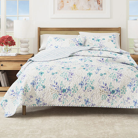 Click here for Linery Blue Floral Reversible Reversible Quilt Set... prices