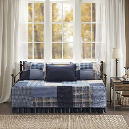 Click here for Woolrich Patchwork Quilted Throw  50 x 70 - Blue prices