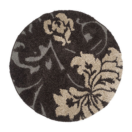 Click here for Safavieh Shag Collection Eric Geometric Round Area... prices