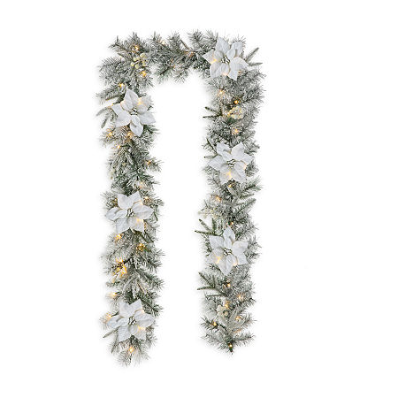 Click here for Glitzhome 9ft Pre-Lit Flocked Pine Christmas Indoo... prices