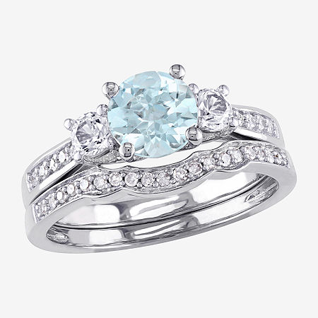 Click here for Womens 1/7 CT. T.W. Genuine Blue Aquamarine 10K Wh... prices
